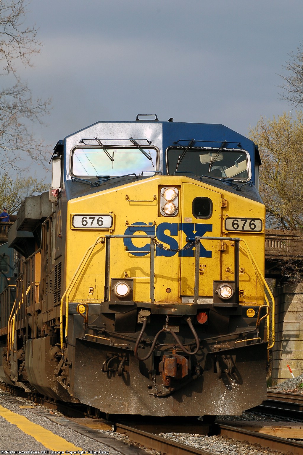 CSXT 676(CW44-6) with storm clouds in the background